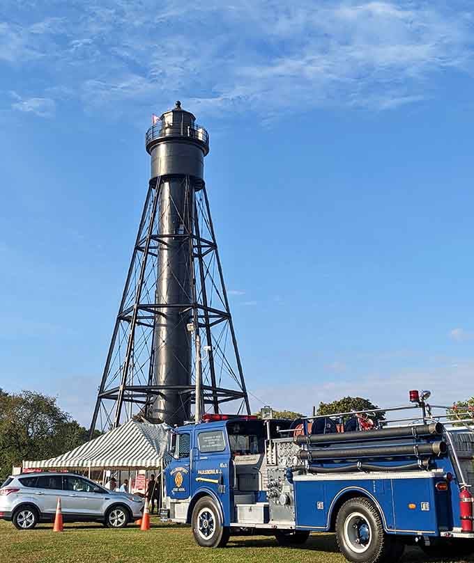 Vintage fire truck meets skeletal lighthouse in a scene that celebrates American ingenuity from every angle imaginable.