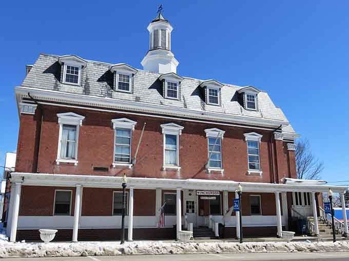 Snow blankets the streets while that mansard roof and cupola stand watch like a New England sentinel.