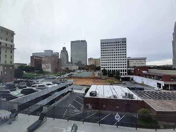 Downtown energy pulses below, proving that retirement doesn't mean giving up excitement and cultural opportunities.