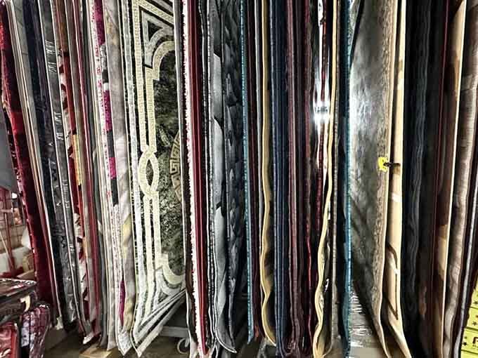 Carpet rolls stand ready to transform your floors, proving home improvement starts with smart flea market shopping.