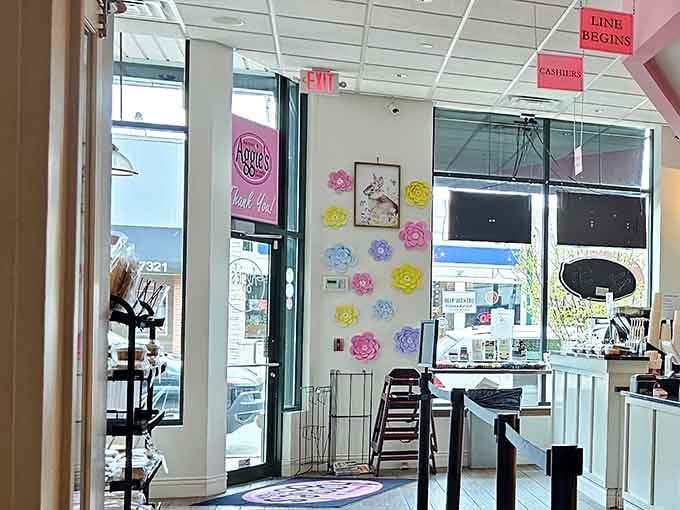 Colorful paper flowers and cheerful decor make waiting in line feel less like waiting, more like anticipating joy.