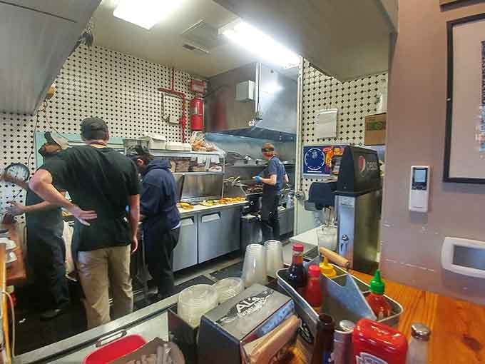 Behind every great burger is a kitchen crew working magic on that griddle like culinary artists with spatulas instead.
