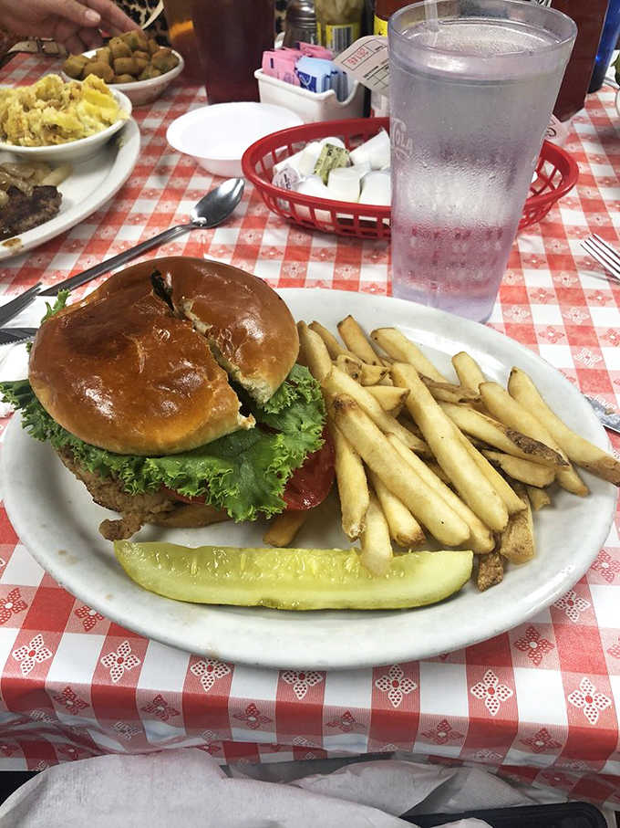 That burger with fries and a pickle spear shows Angie's doesn't just do breakfast right.