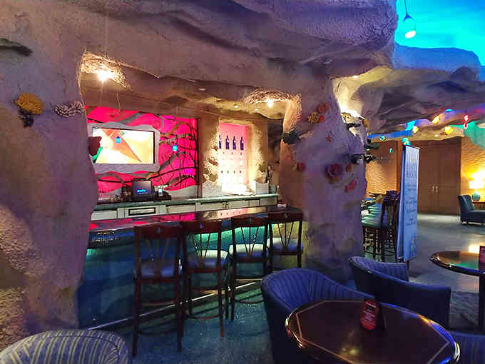 Another angle reveals the cave-like atmosphere with blue lighting that makes you feel truly submerged.