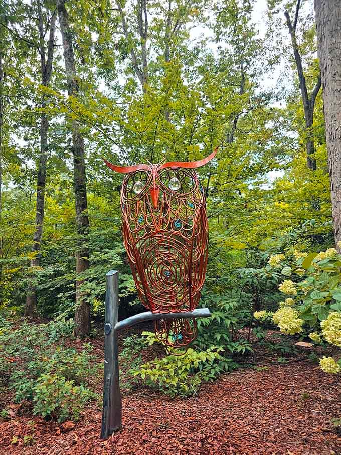 This wise owl sculpture watches over the garden like a guardian of tranquility, minus the actual hooting at 3 AM.