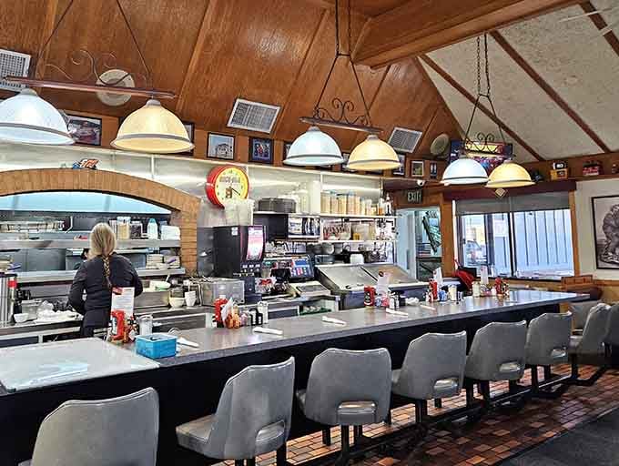 Counter seating offers front-row views of the breakfast show, complete with sizzling griddles and friendly banter.