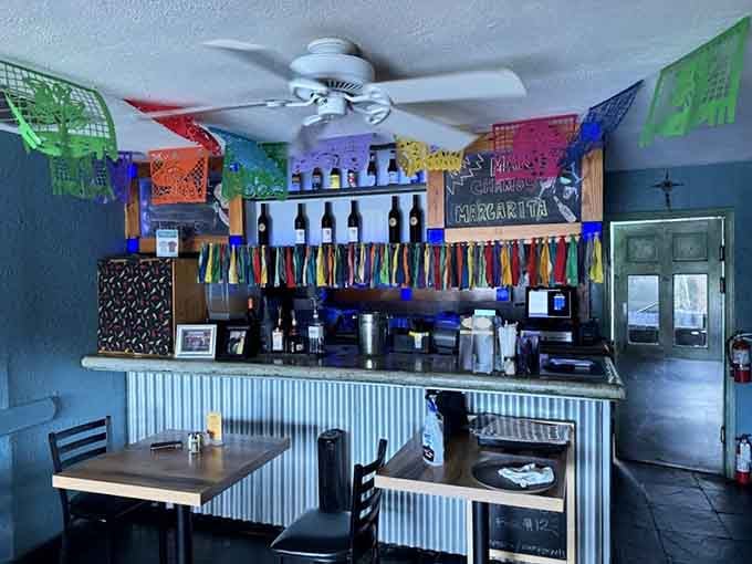Corrugated metal and colorful banners behind the counter create a casual vibe that says "relax, you're among friends here."