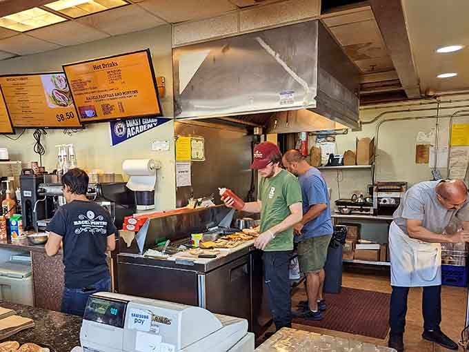 The team behind the counter works with practiced efficiency, turning out breakfast magic for the morning rush.