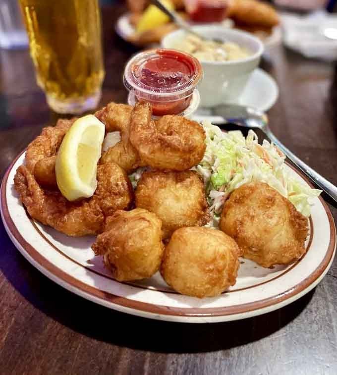 Golden tempura-battered scallops and prawns that practically float off the plate in crispy, delicate perfection.