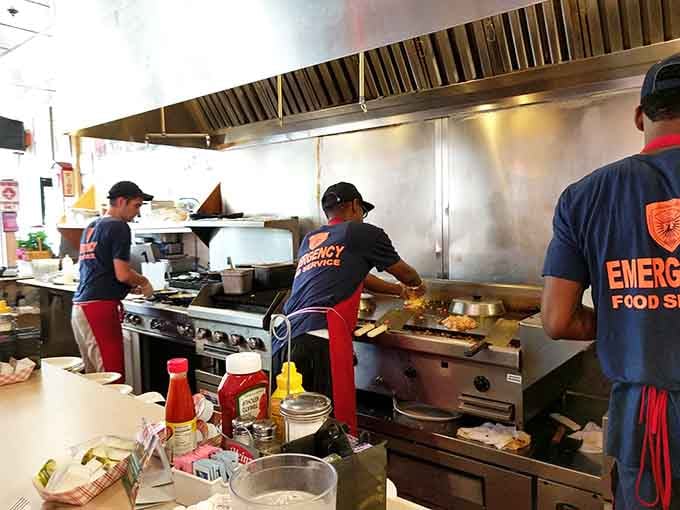 The kitchen crew works with the efficiency of a well-trained emergency response team, minus the sirens.