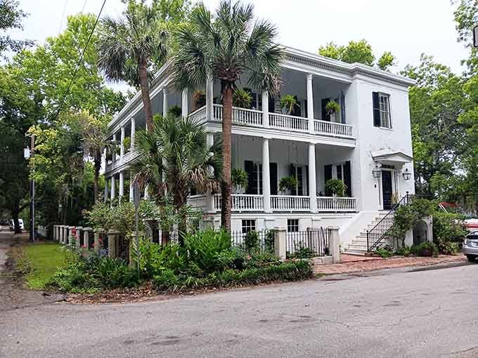 Double-decker porches and pristine white columns showcase antebellum architecture that survived wars, hurricanes, and changing times remarkably intact.