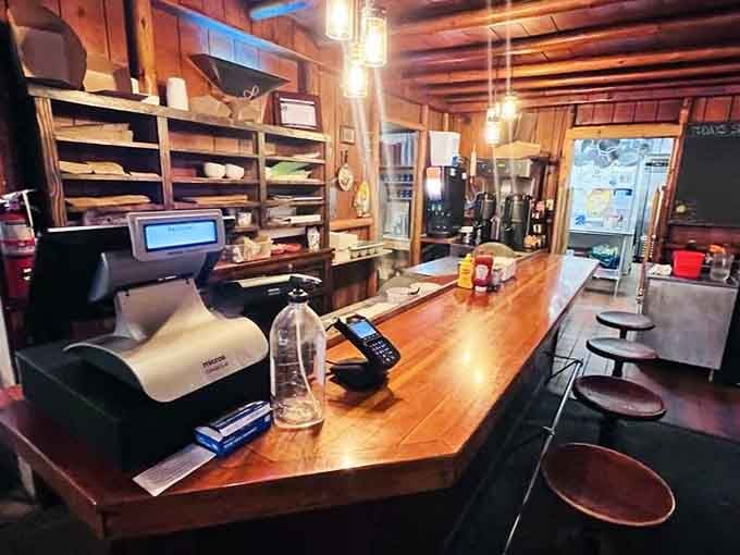 The rustic bar area with wooden counter shows this place has been welcoming hungry travelers for generations now.
