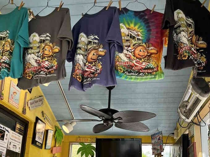 Merchandise hanging from the ceiling means you can literally wear your love for this place on your sleeve.