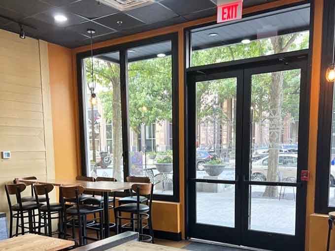 Large windows let natural light stream in, illuminating your path to carbohydrate happiness and cheese-induced bliss.