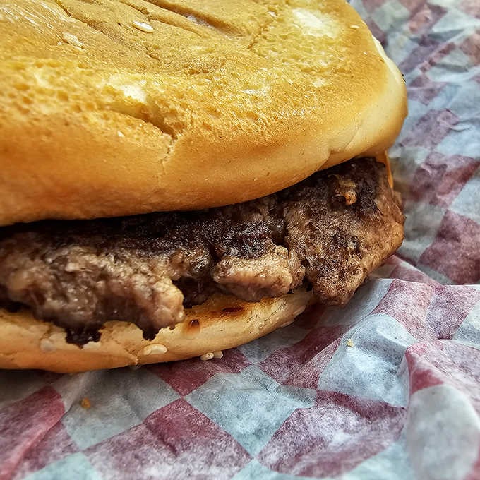 Up close, this patty reveals the kind of char and juice that separates the legends from the pretenders.
