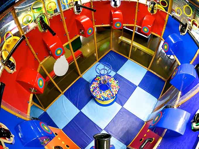 The Ballistics Arena where kids learn that getting pelted with foam balls is actually the highlight of their week.