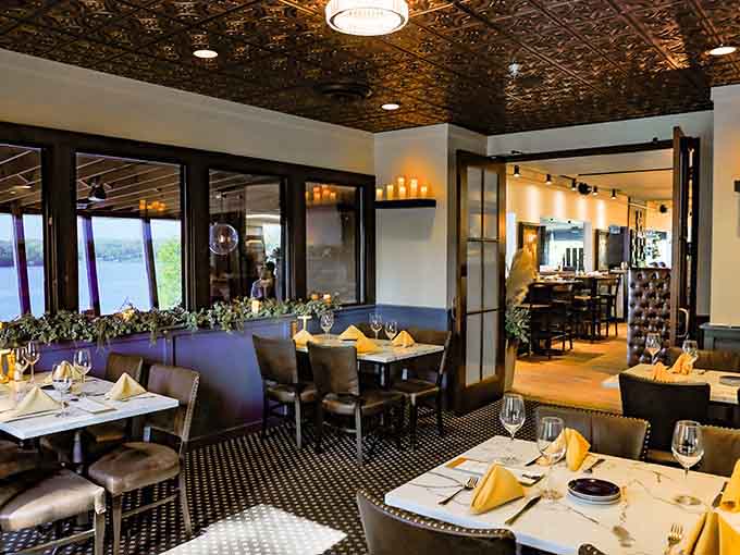 Elegant table settings and expansive windows prove that supper club dining has evolved beautifully into the modern era.