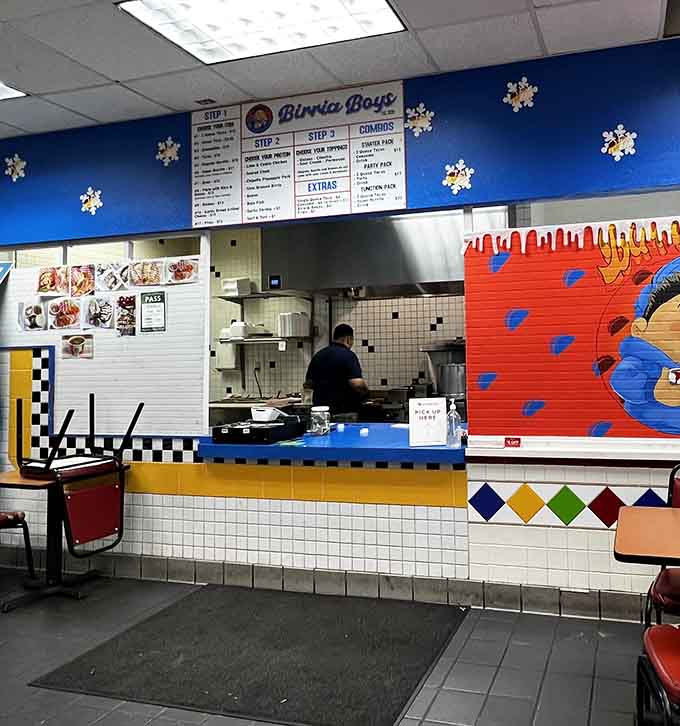 The ordering counter where gas station dreams come true, complete with that welcoming Elk Grove mural behind it.