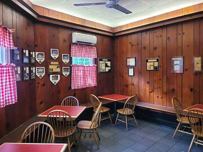 Red-checkered curtains and plaques on the walls tell stories of decades spent serving happy, satisfied customers every day.