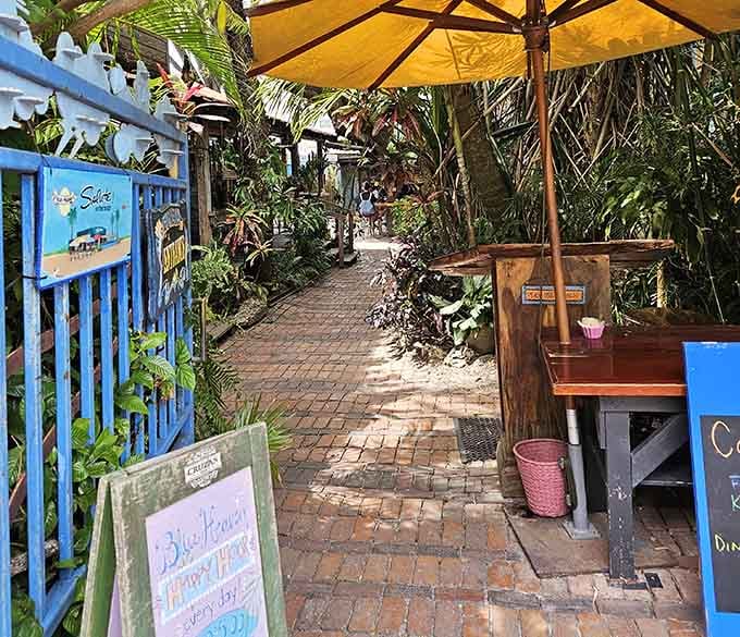 That brick pathway through tropical foliage feels like the Yellow Brick Road, except it leads to pancakes instead of Oz.