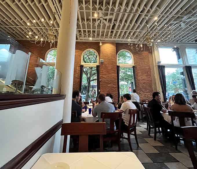 The energy in this room tells you everything: people come here to celebrate life, one spectacular bite at a time.