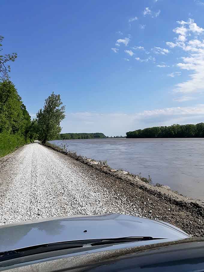 A peaceful path along the water offers serene views before you encounter standing boats and question reality.