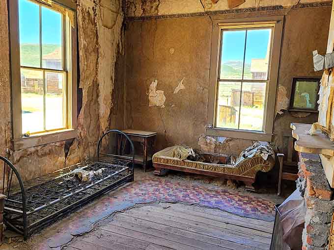 Peeling wallpaper and abandoned beds tell intimate stories of families who once called this desolate place home.