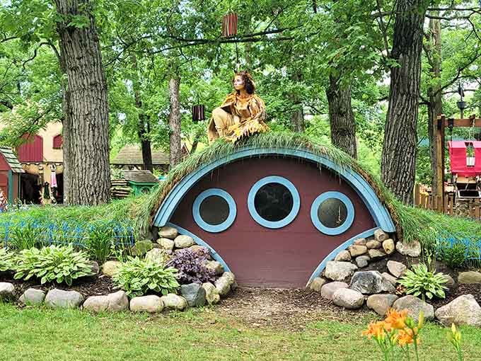 A hobbit hole nestled among the trees reminds us that fantasy knows no single era or rulebook.