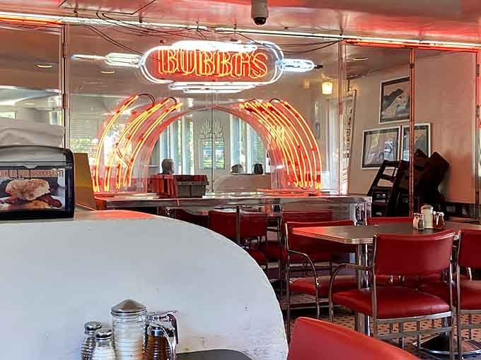 That glowing neon Bubba's sign adds serious retro charm to an already photogenic dining room.