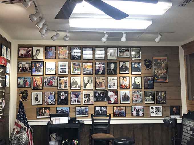 Framed photos covering the wall celebrate community and connection, reminding you that great restaurants are built on relationships, not just recipes.