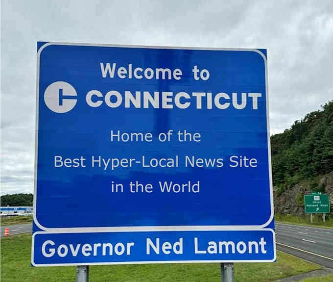 That "Best Hyper-Local News Site" sign is either very specific or someone's having fun with Photoshop.