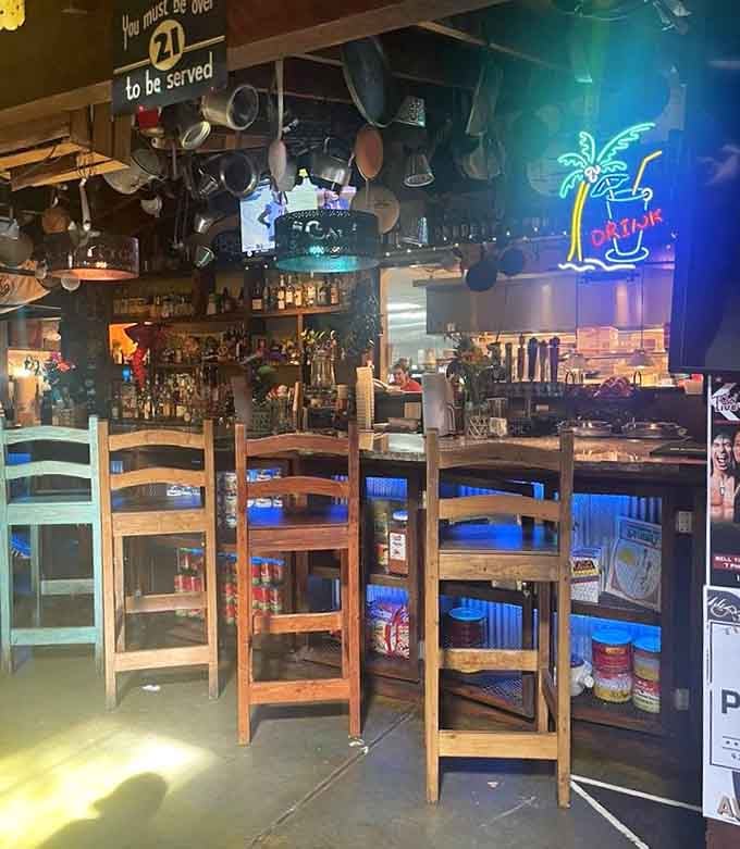 The bar area is decked out with enough personality and tropical flair to make you forget you're landlocked.