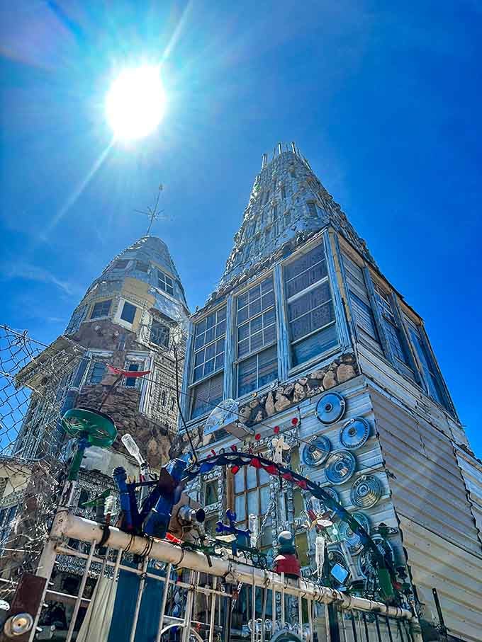 Sunlight catches the metallic surfaces just right, turning recycled materials into something almost holy and definitely spectacular.