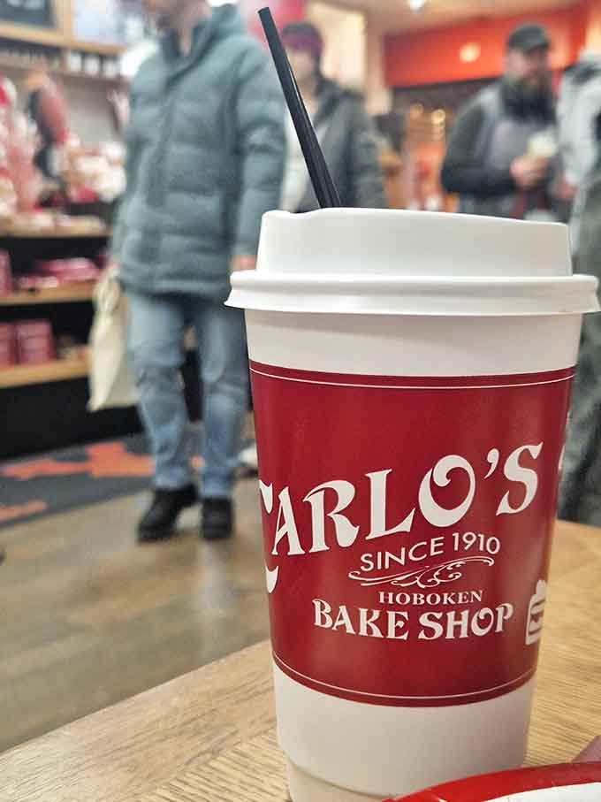 Even the coffee cup knows it's part of something special, proudly wearing the Carlo's name like a badge of honor.