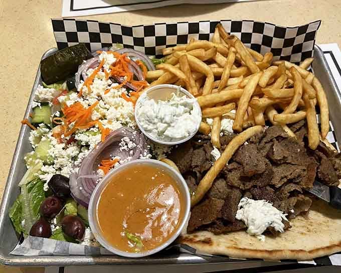 This gyro platter arrives like a Greek feast decided to vacation in Pennsylvania and brought all its friends.