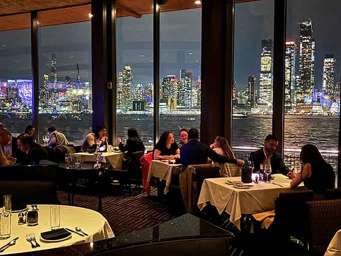 Diners enjoying skyline views at sunset have clearly figured out how Tuesday nights should actually work in life.