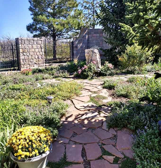 These garden pathways wind through flowers and stone like a secret passage to your own private Scottish estate.