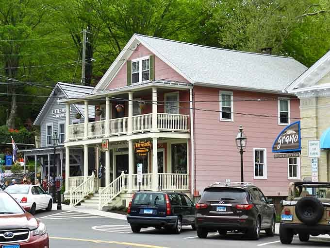 A pink building with double porches is basically Connecticut's way of saying we do whimsy with historical accuracy, thank you.