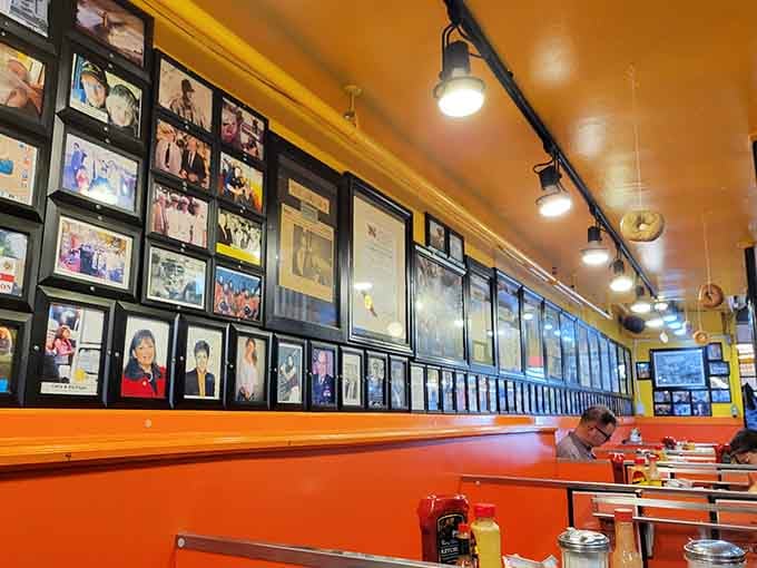 Every framed photo tells a story of someone who ate here and left happier than they arrived.