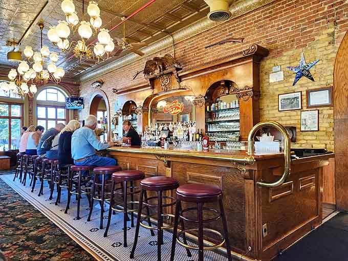 A historic bar where the wood gleams and the atmosphere whispers stories from decades of good times and great drinks.