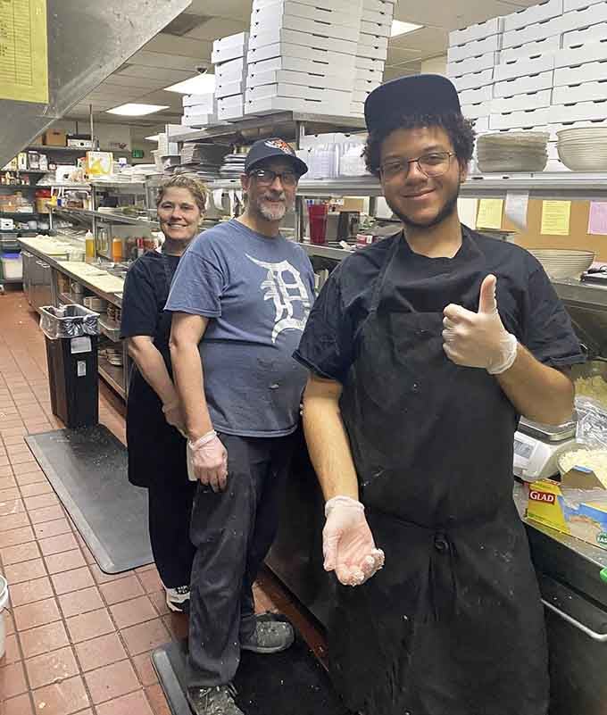 The smiling faces behind the scenes who keep this Detroit-style pizza tradition alive, one perfect pie at a time.