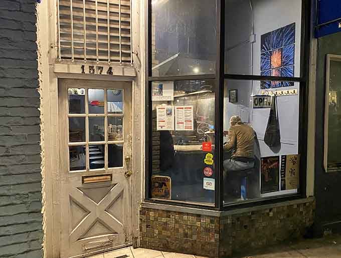 The unassuming entrance that locals walk through daily while tourists pass by searching for something more obvious.