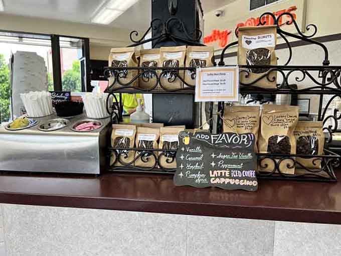 The coffee station stands ready with flavored options because even your caffeine deserves a little excitement this morning.