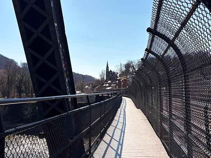 The footbridge crossing into West Virginia, where your Maryland hike officially becomes a two-state adventure worth bragging about.