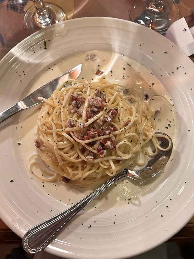 Carbonara done right: creamy, bacon-studded pasta that proves simplicity can be absolutely spectacular when executed properly.