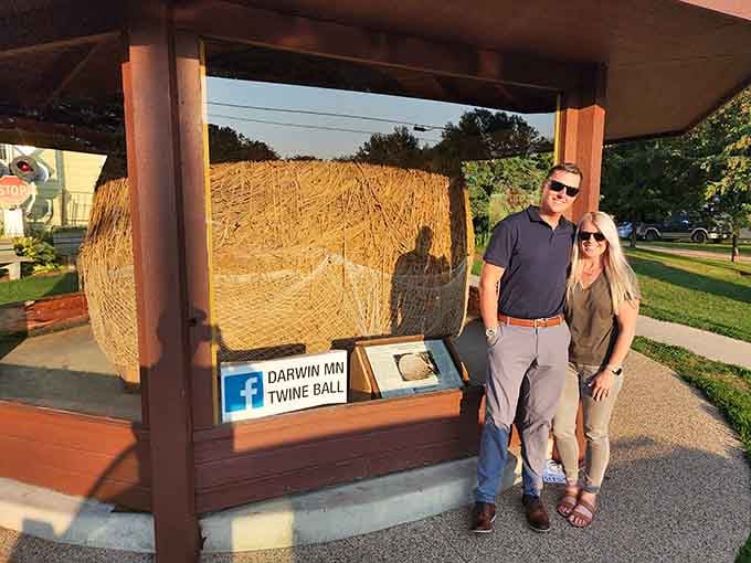 Sunset visitors pose with their new favorite conversation starter, creating memories that defy rational explanation but feel absolutely right.