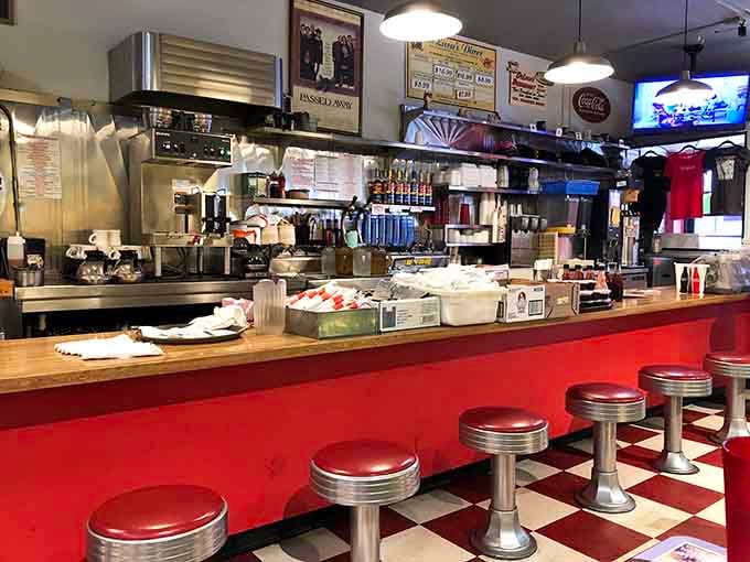 Counter seating offers front-row tickets to the breakfast show, where griddles sizzle and magic happens in real time.