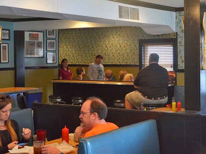 Real people enjoying real food in a real diner, which is increasingly rare and infinitely more valuable than any trendy spot.