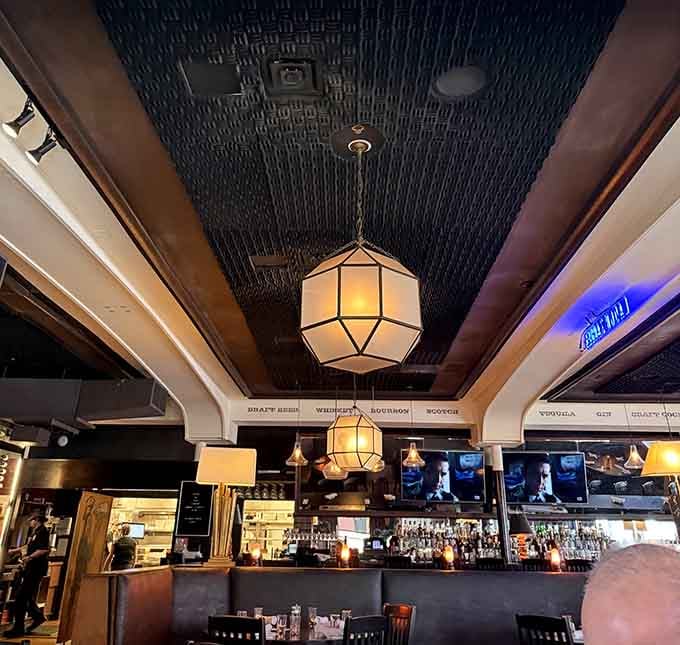 Those geometric pendant lights add modern sophistication while keeping the vibe approachable and genuinely welcoming throughout.