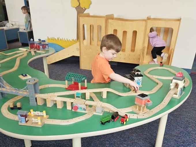 Train tables that would make any adult jealous, proving some toys transcend age limits entirely.